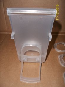 GRAVITY HOPPER WITH ADJUSTABLE HOLE